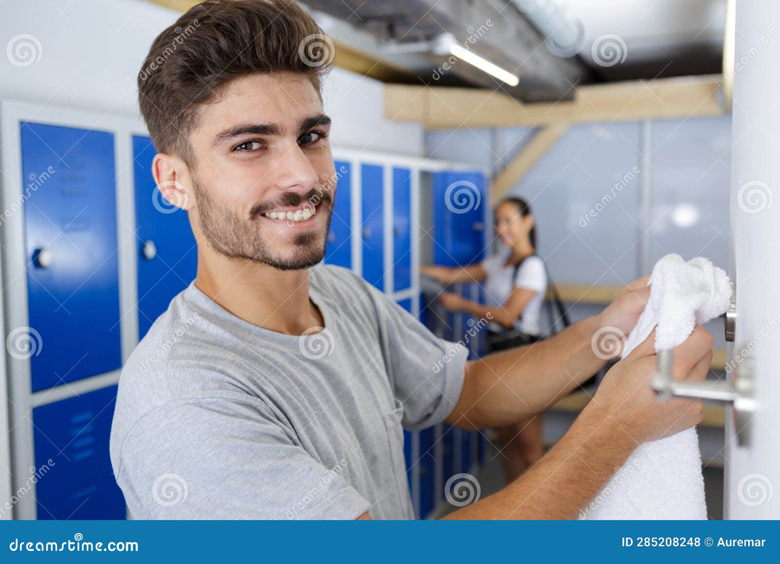 Man Putting Towel on Hook in Locker Room Stock Photo - Image of trainer ...