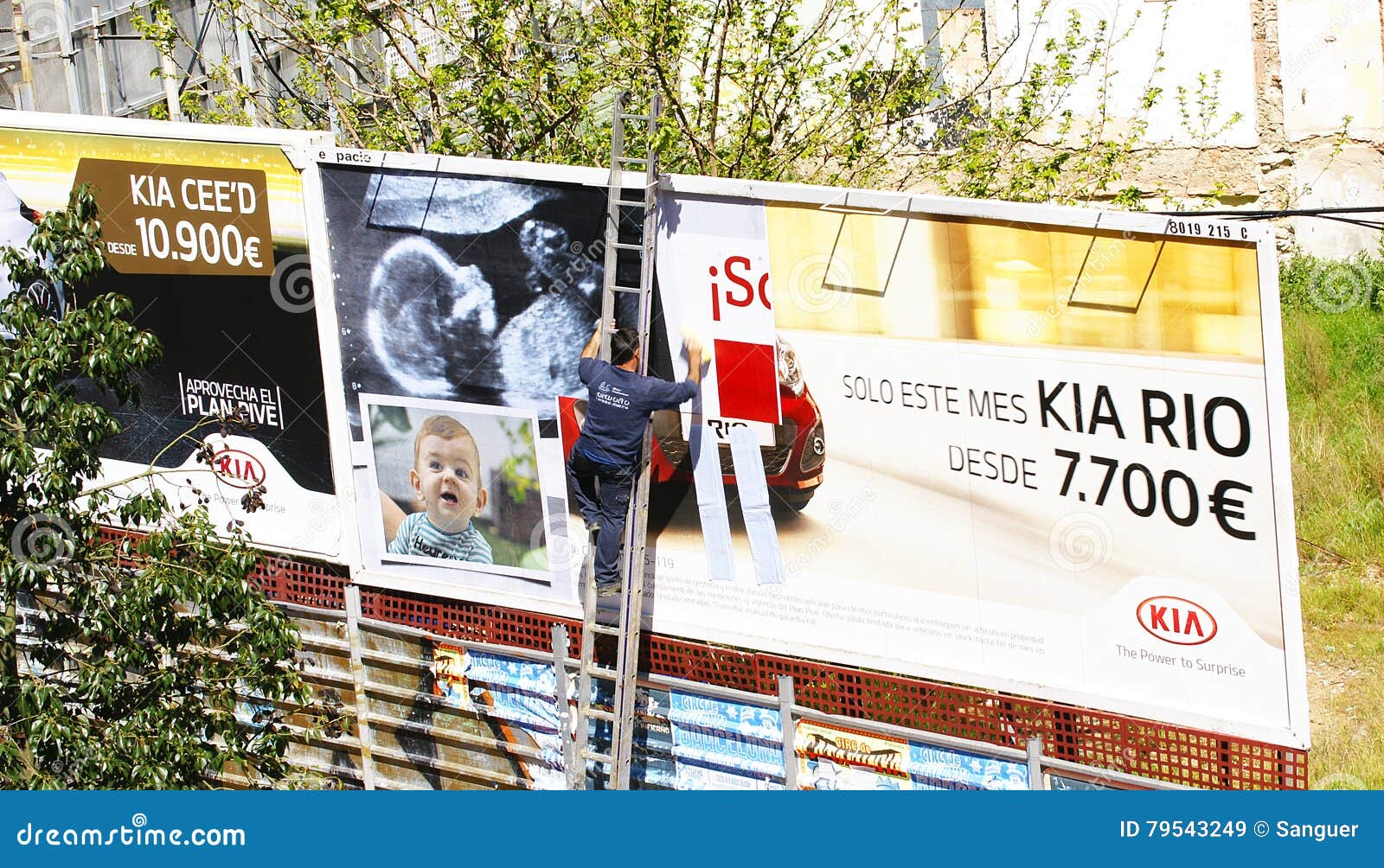 Man putting up a billboard editorial stock image. Image of billboards ...