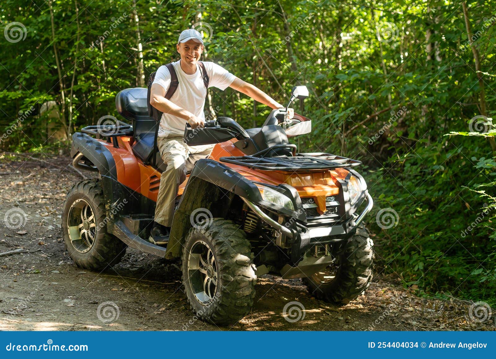Man Quad Bike in the Forest Stock Photo - Image of danger, adult: 254404034
