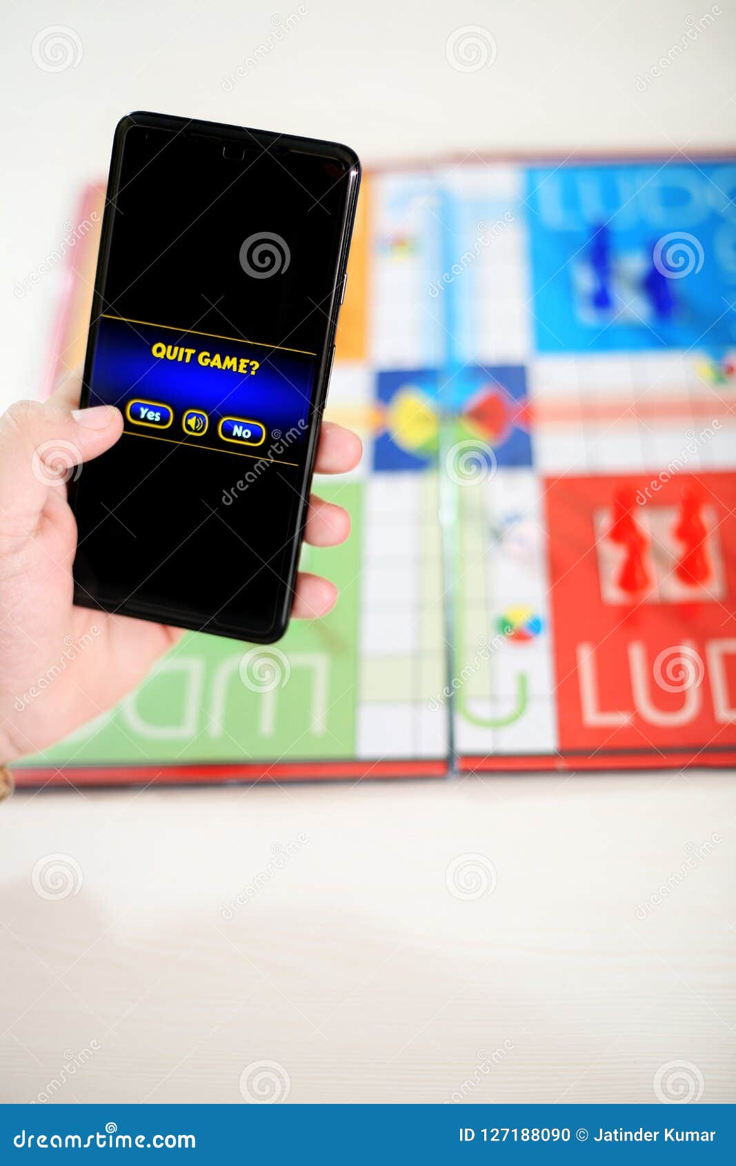 Man is Quit Game in Phone. Picture of Ludo Board Game Editorial Image ...