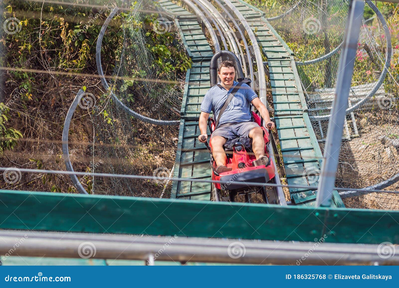 Man on Rail Downhill on a Trolley, Point of View during a Ride on ...