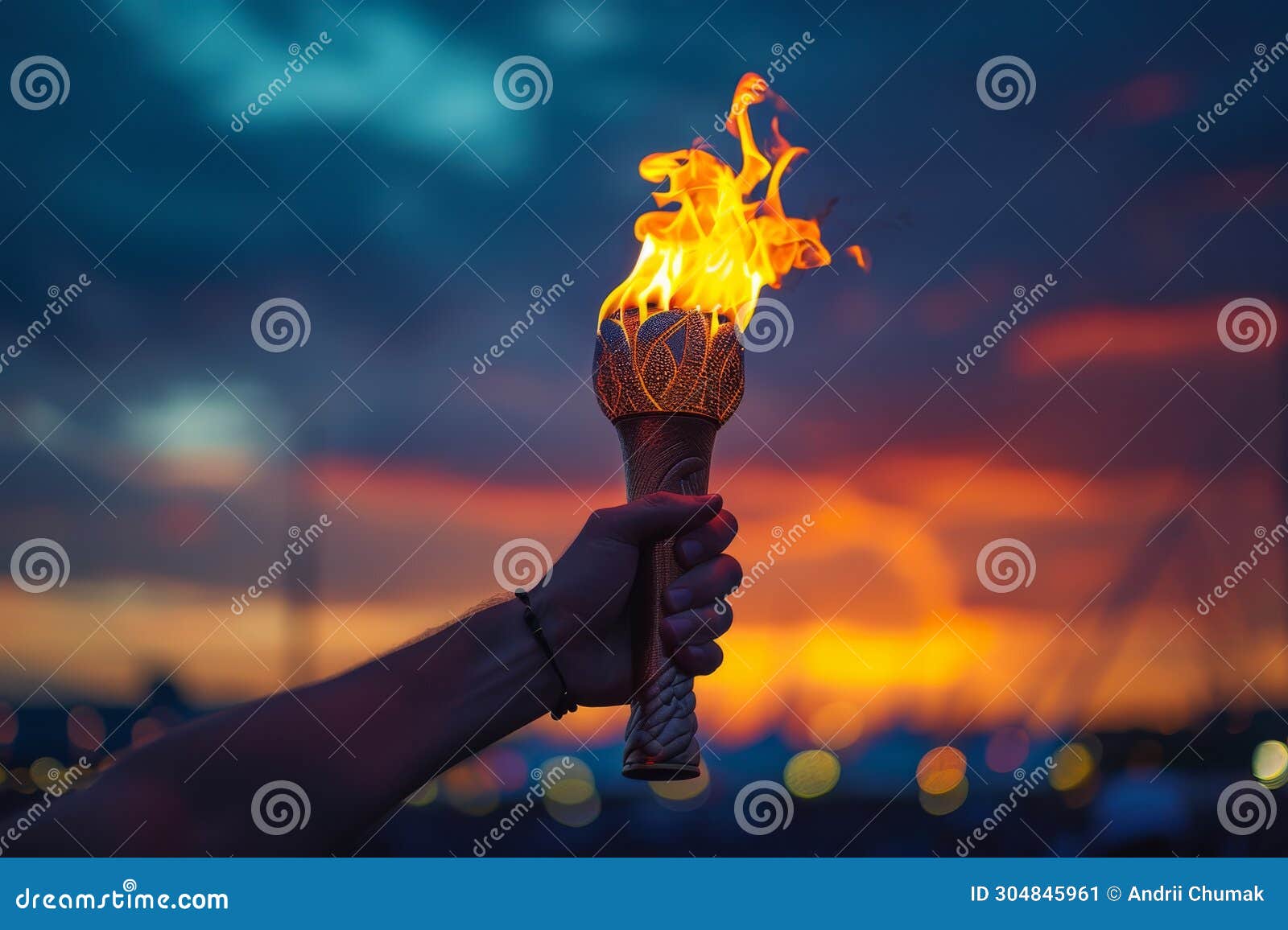 Man Raising the Olympic Torch with Flame in Front of the Eiffel Tower ...