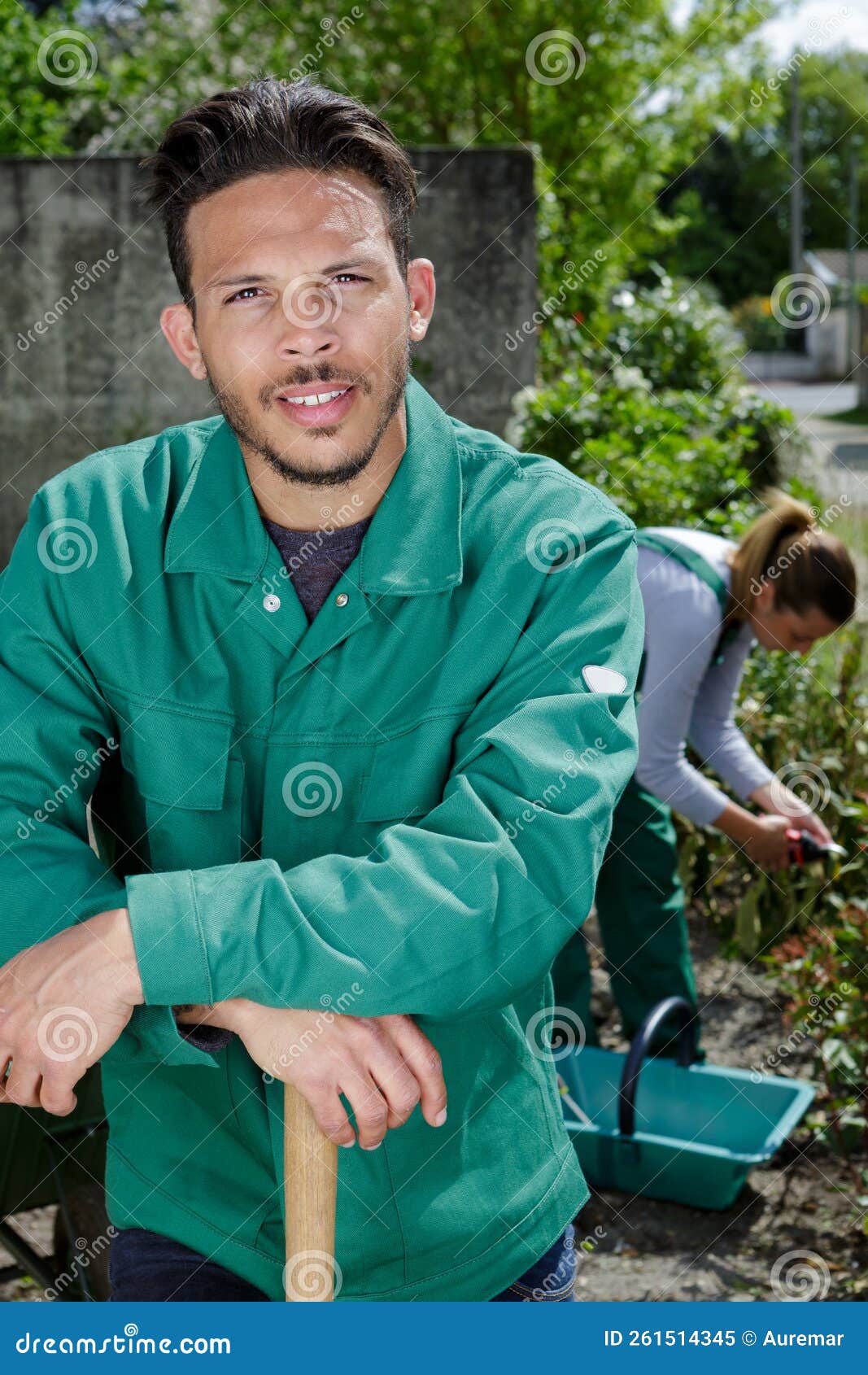 Man with rake in garden stock image. Image of tools - 261514345