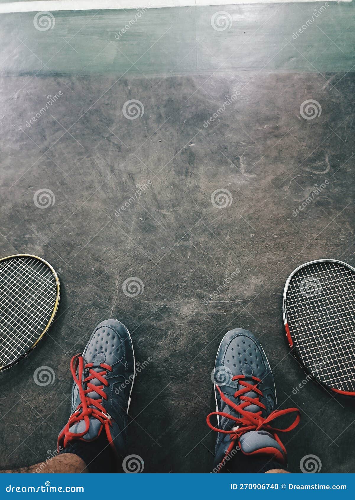 A Man with the Raket after Playing Badminton Stock Photo - Image of ...