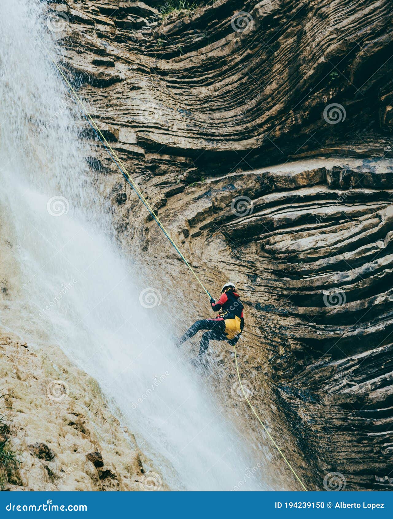Man Rappelling Down a Waterfall Stock Photo - Image of landscape ...