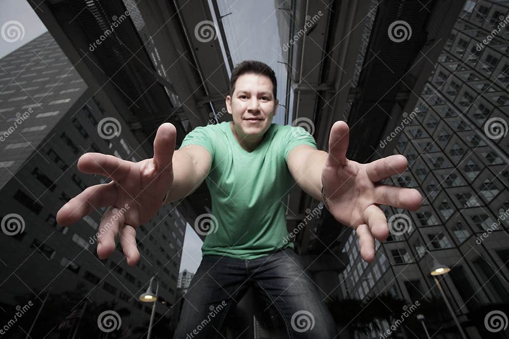 Man Reaching Down Towards the Camera Stock Photo - Image of building ...