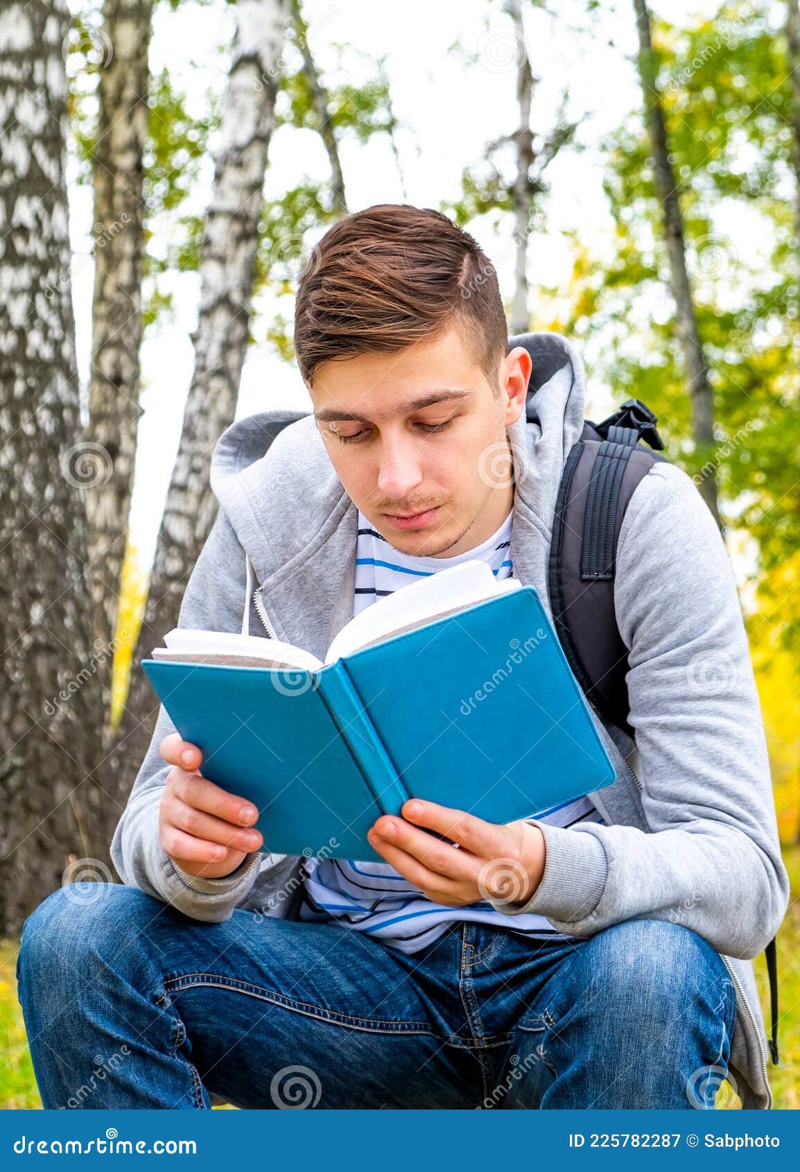 Man read a Book stock image. Image of loneliness, hold - 225782287