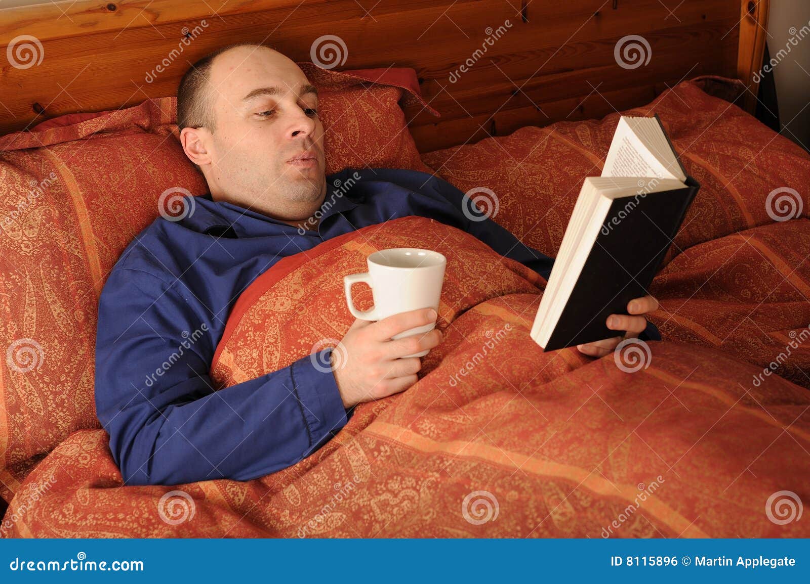 Man reading in bed stock photo. Image of adult, interior - 8115896