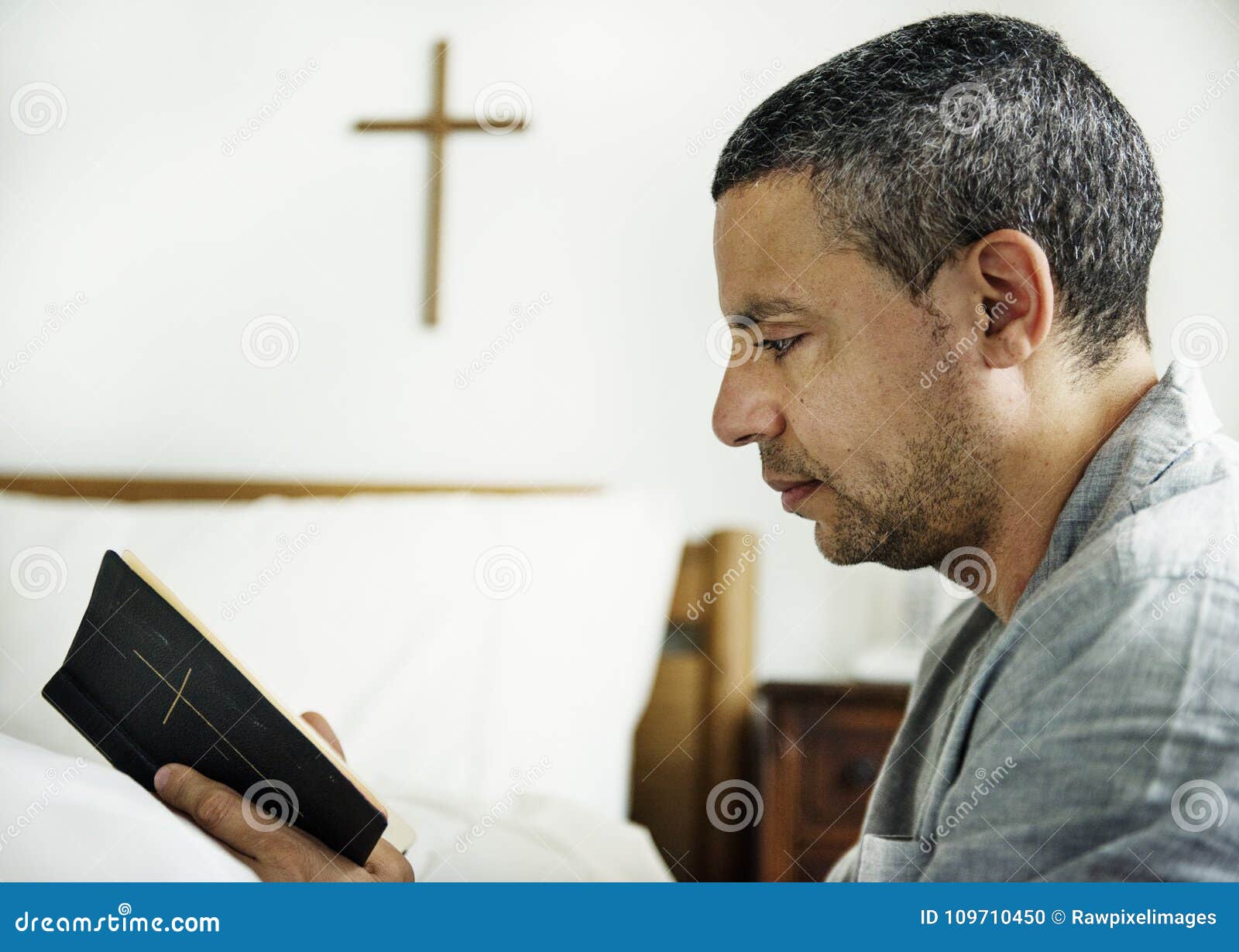 A man reading a bible stock photo. Image of christianity - 109710450