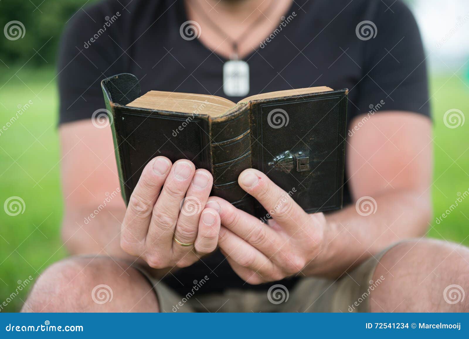 Man reading a bible stock photo. Image of religion, book - 72541234