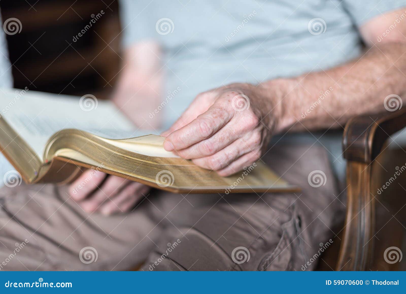 Man reading the Bible stock photo. Image of reading, hand - 59070600