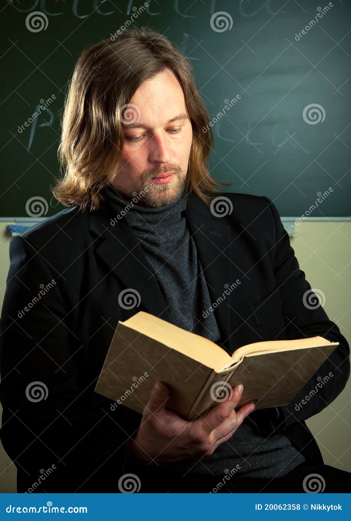 Man reading a book stock photo. Image of library, thoughtful - 20062358