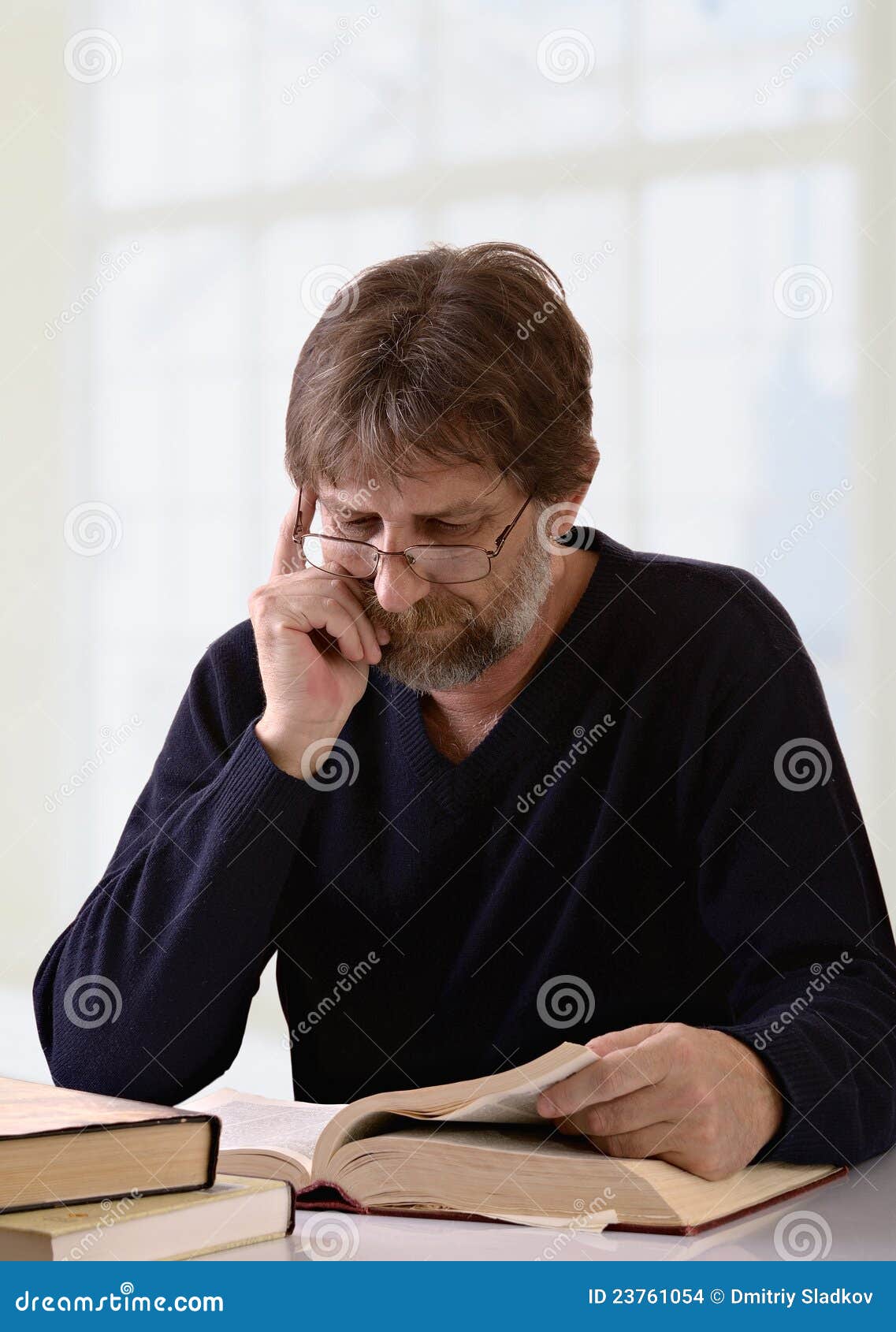 Man reading a book stock photo. Image of information - 23761054