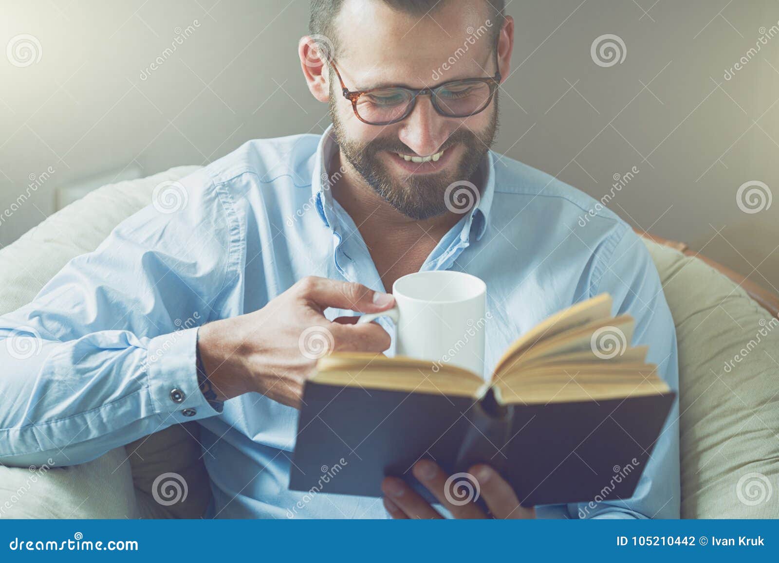 Man Reading Book with Coffee Stock Photo - Image of enjoyment, interest ...