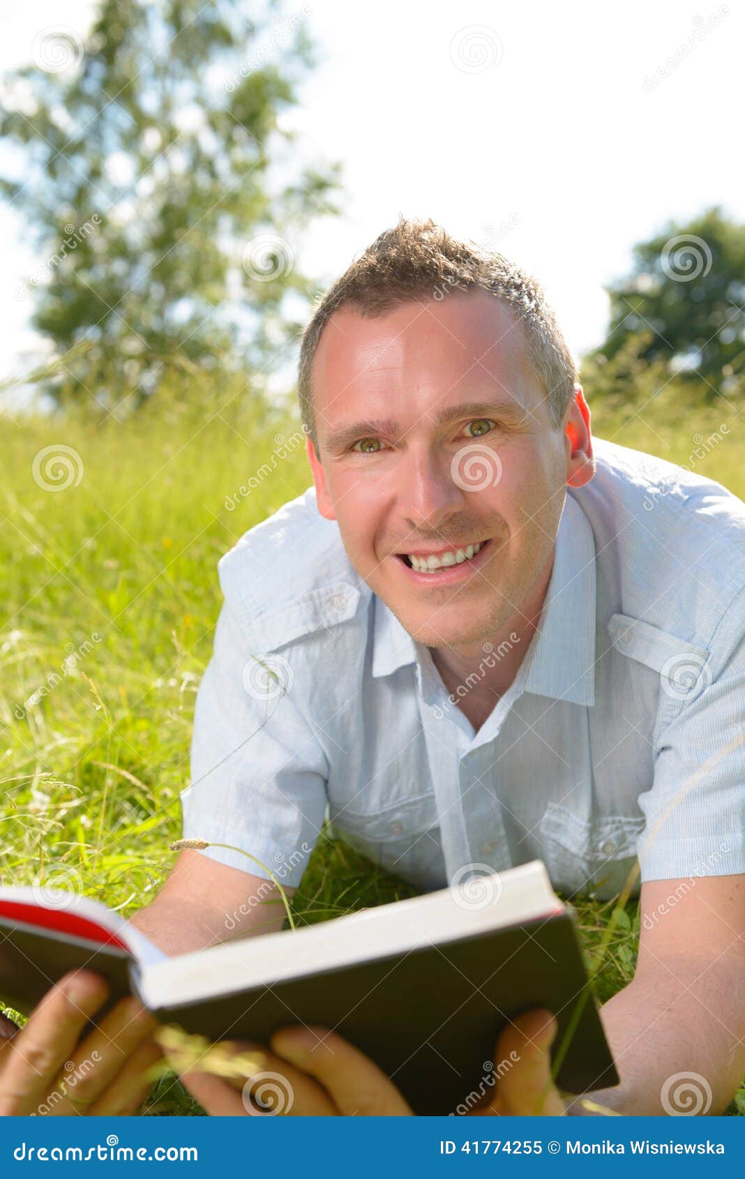 Man reading book stock image. Image of green, casual - 41774255