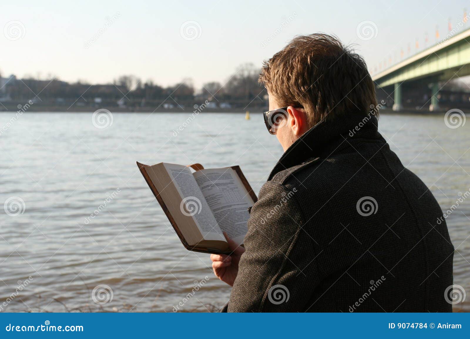 Man reading book outdoor stock photo. Image of reading - 9074784