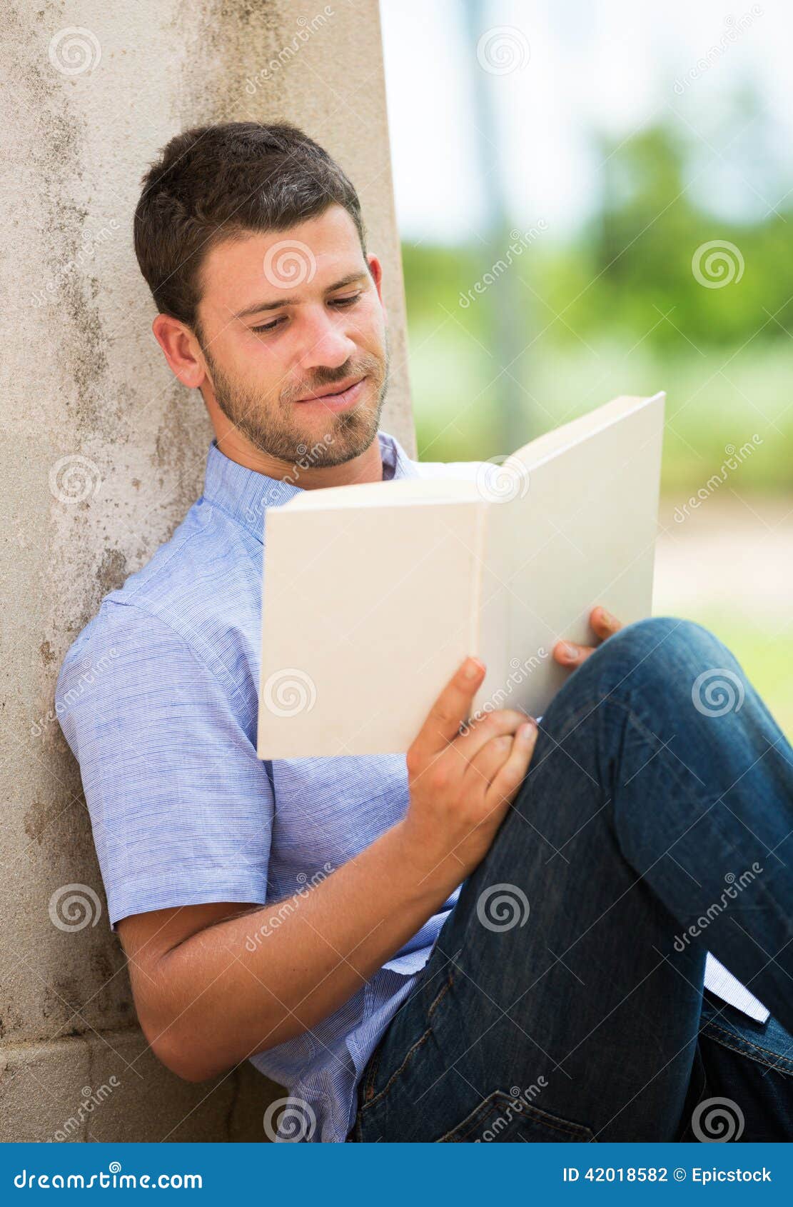 Man reading book outside stock photo. Image of colllge - 42018582