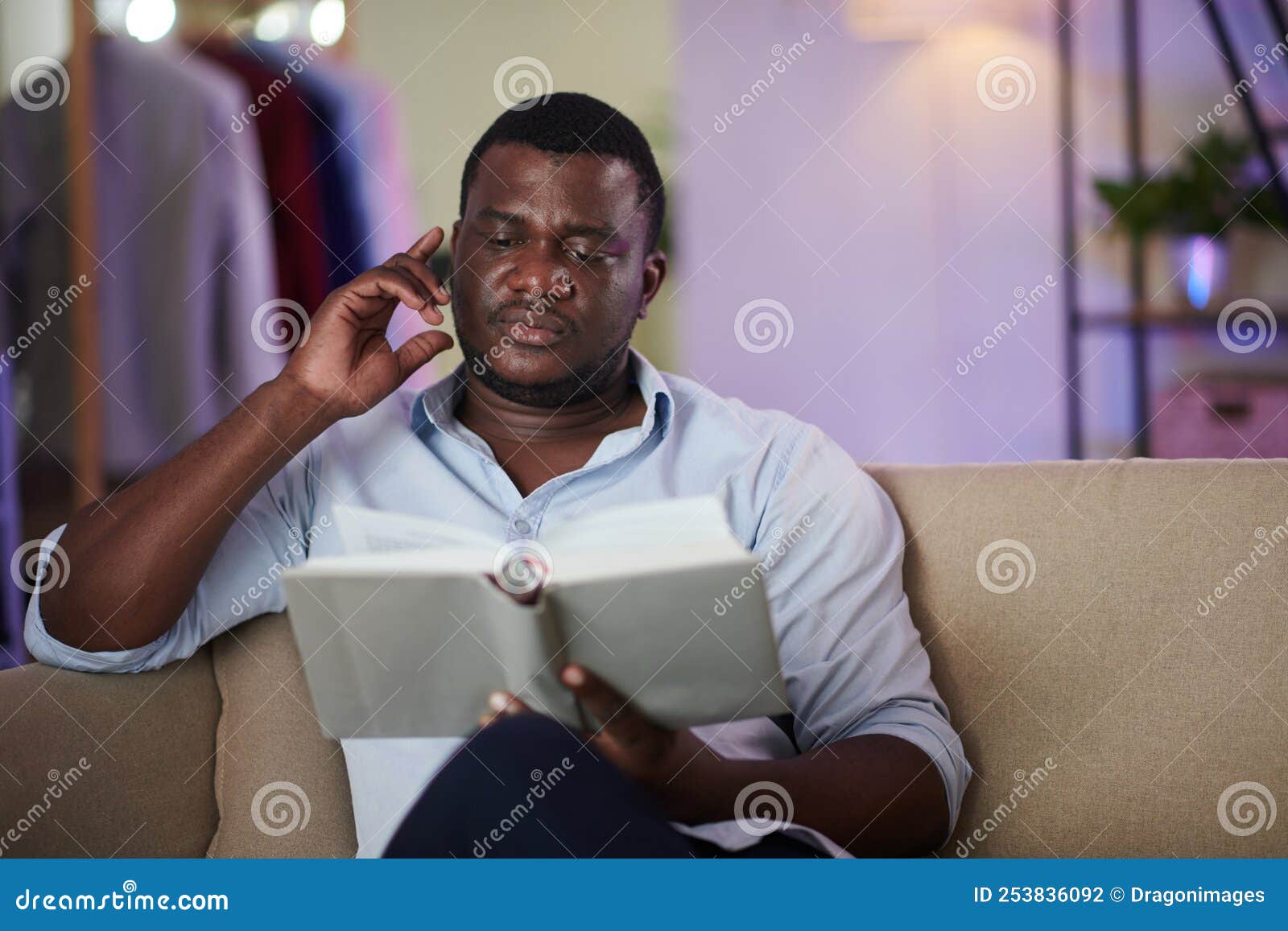 Man Reading Book on Self Improvement Stock Photo - Image of lifestyle ...
