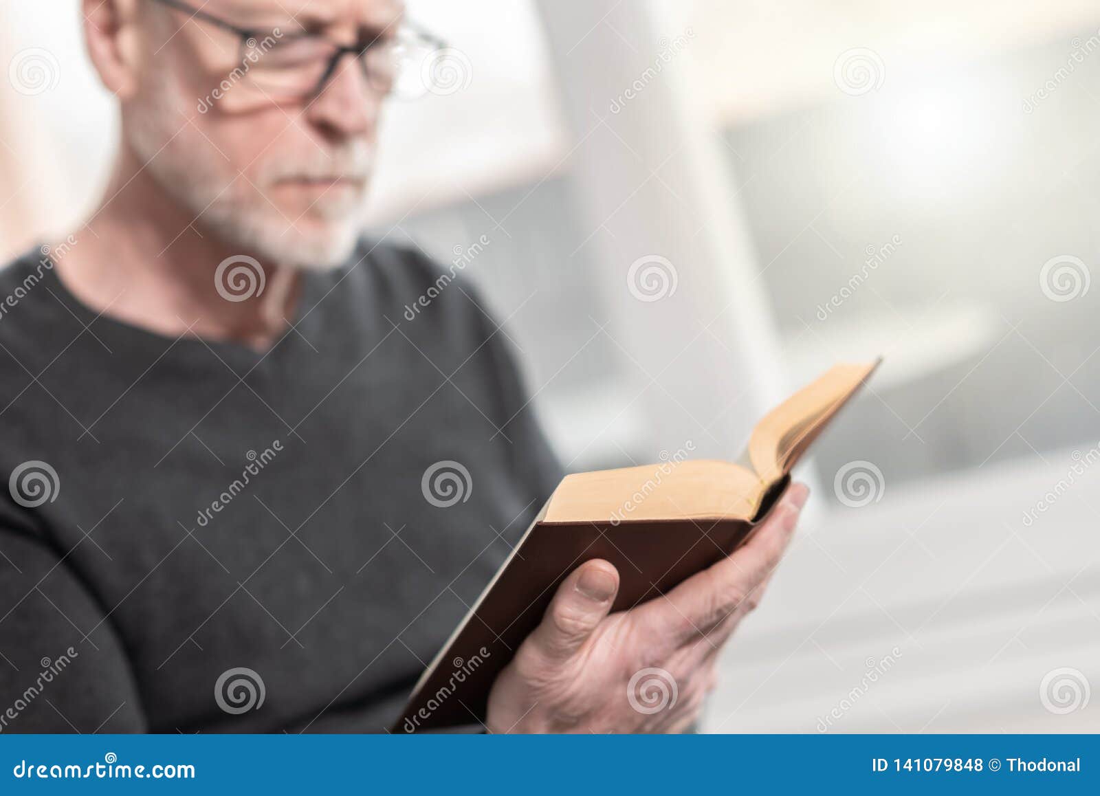 Man reading a book stock photo. Image of knowledge, books - 141079848
