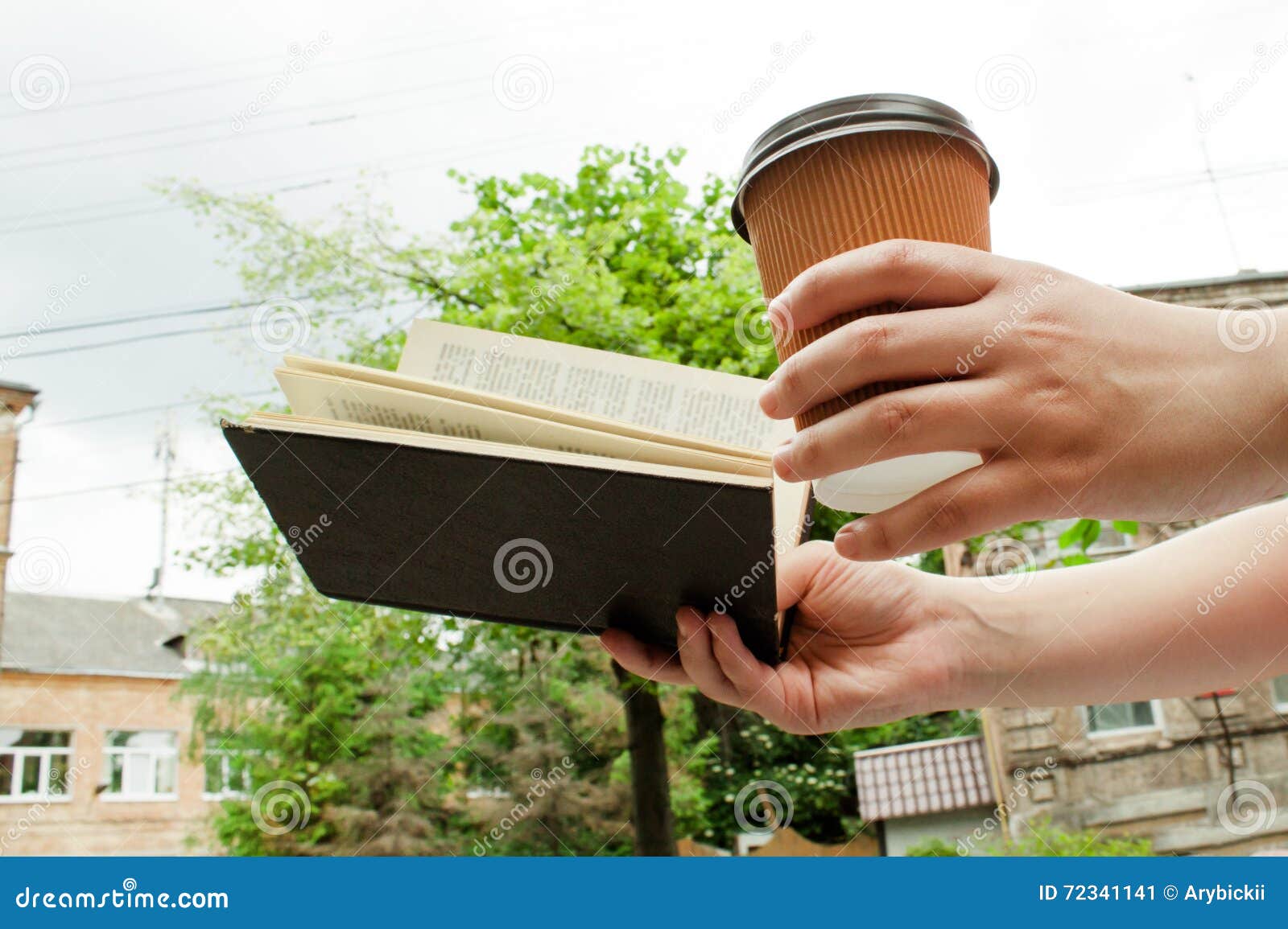Man Reading a Book on the Street. Stock Image - Image of issues ...