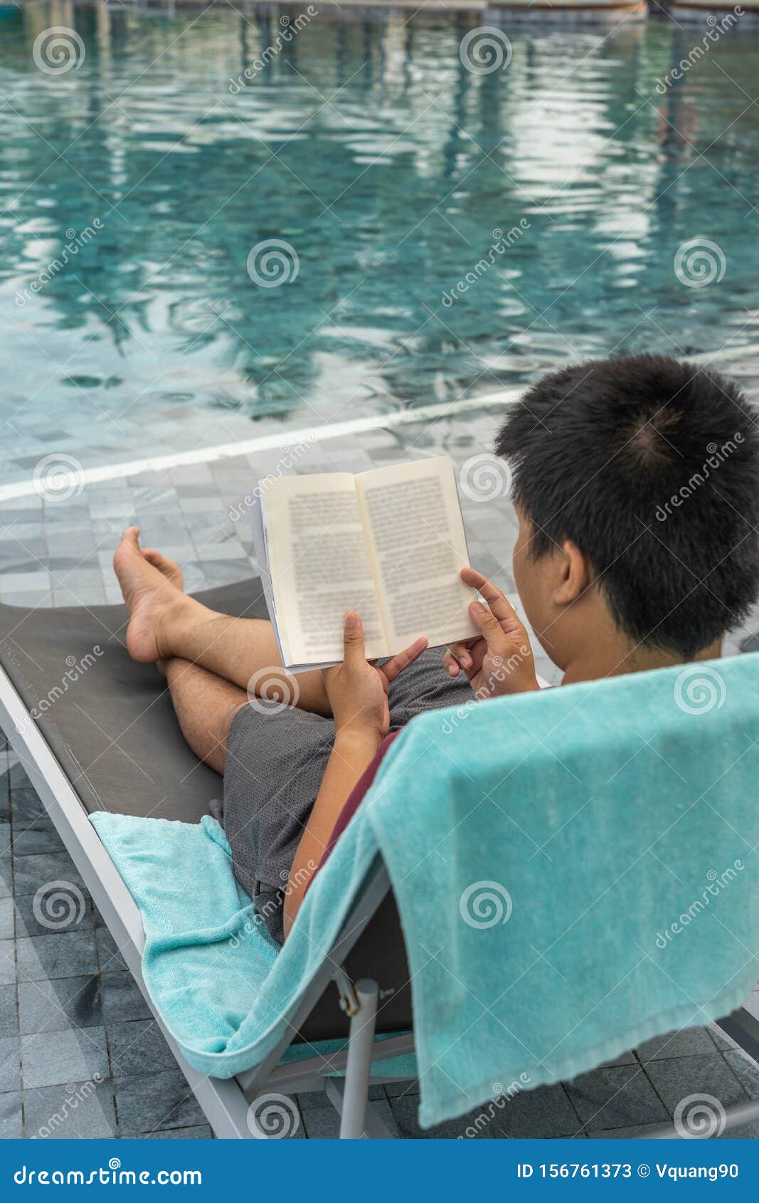 Man Reading Book at the Swimming Pool Stock Image - Image of freelance ...