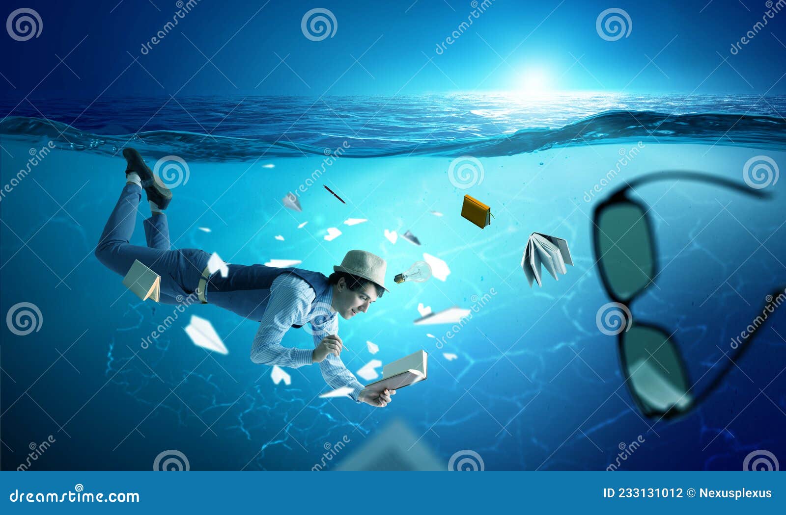 Man Reading a Book Underwater Stock Photo - Image of literature, hobby ...