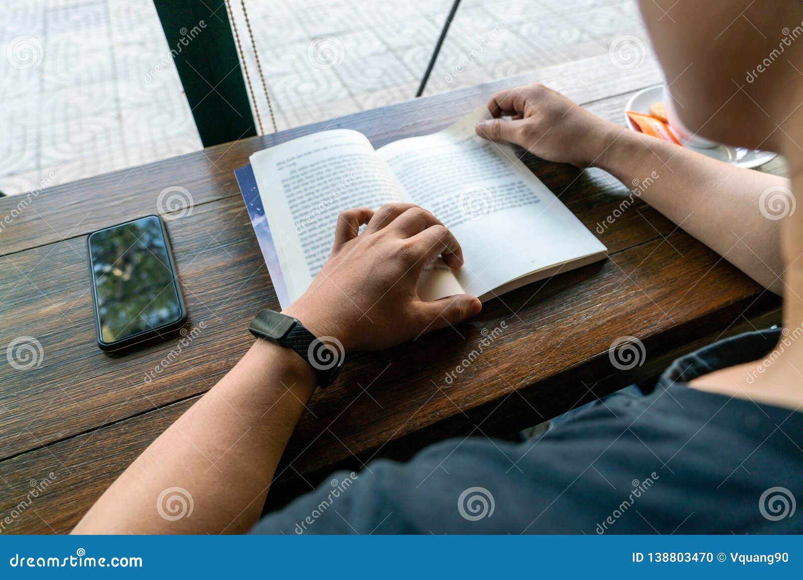 Man Reading Book on the Wooden Table Stock Photo - Image of paper ...