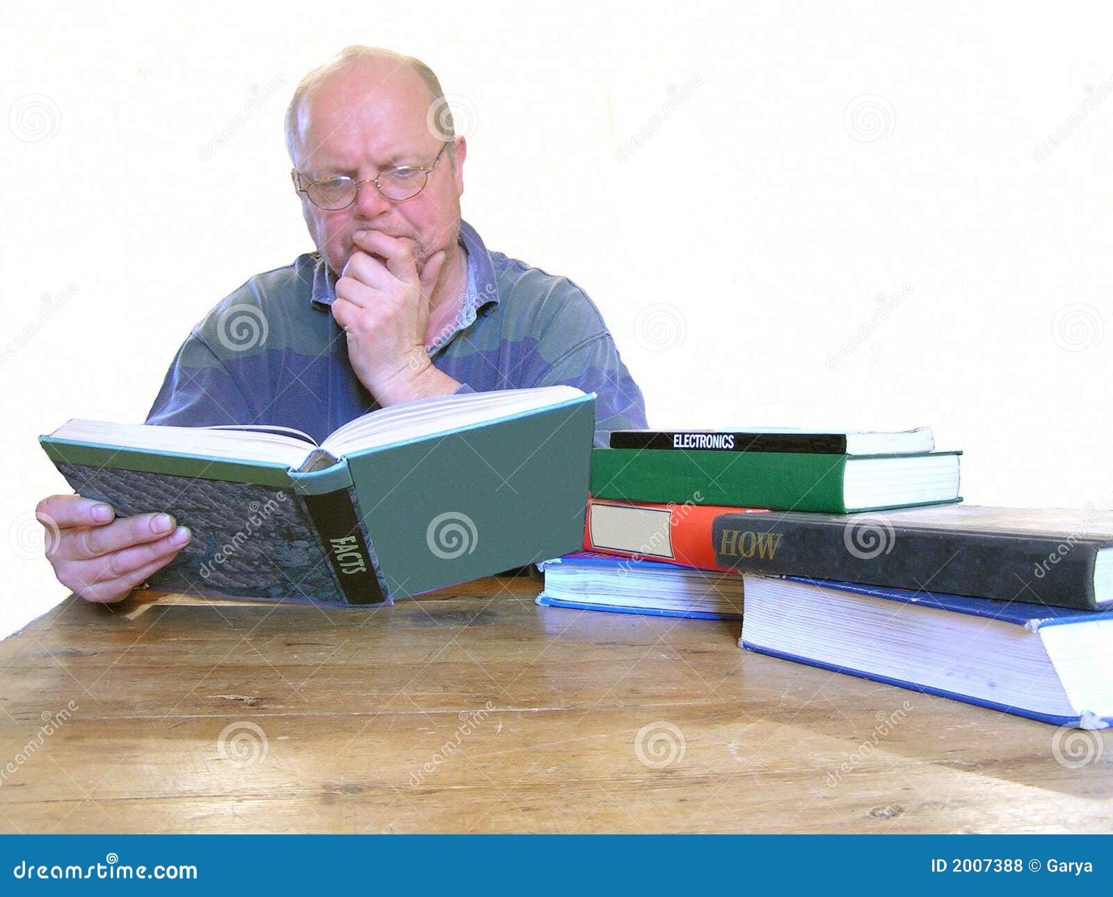 A man reading books stock photo. Image of research, library - 2007388