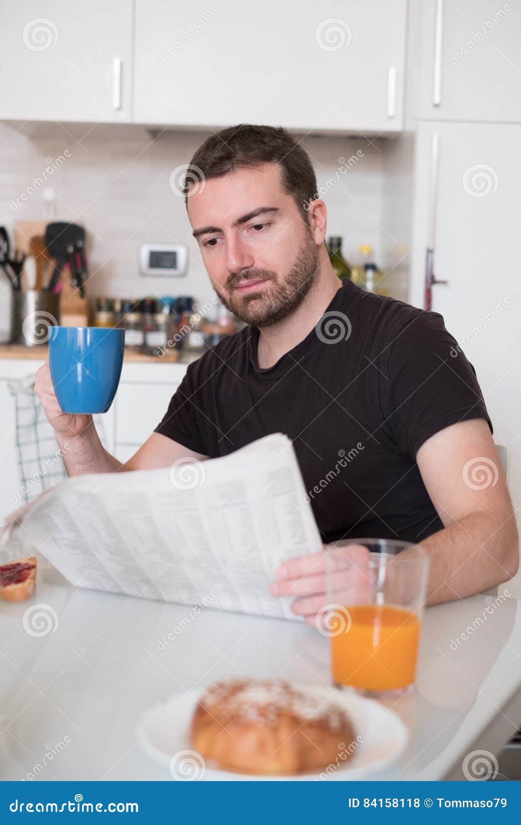 Man Reading His Newspaper during Morning Breakfast Stock Photo - Image ...