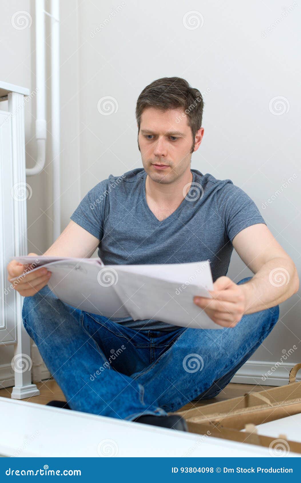 Man is Reading the Instructions. Stock Photo - Image of looking, pack ...