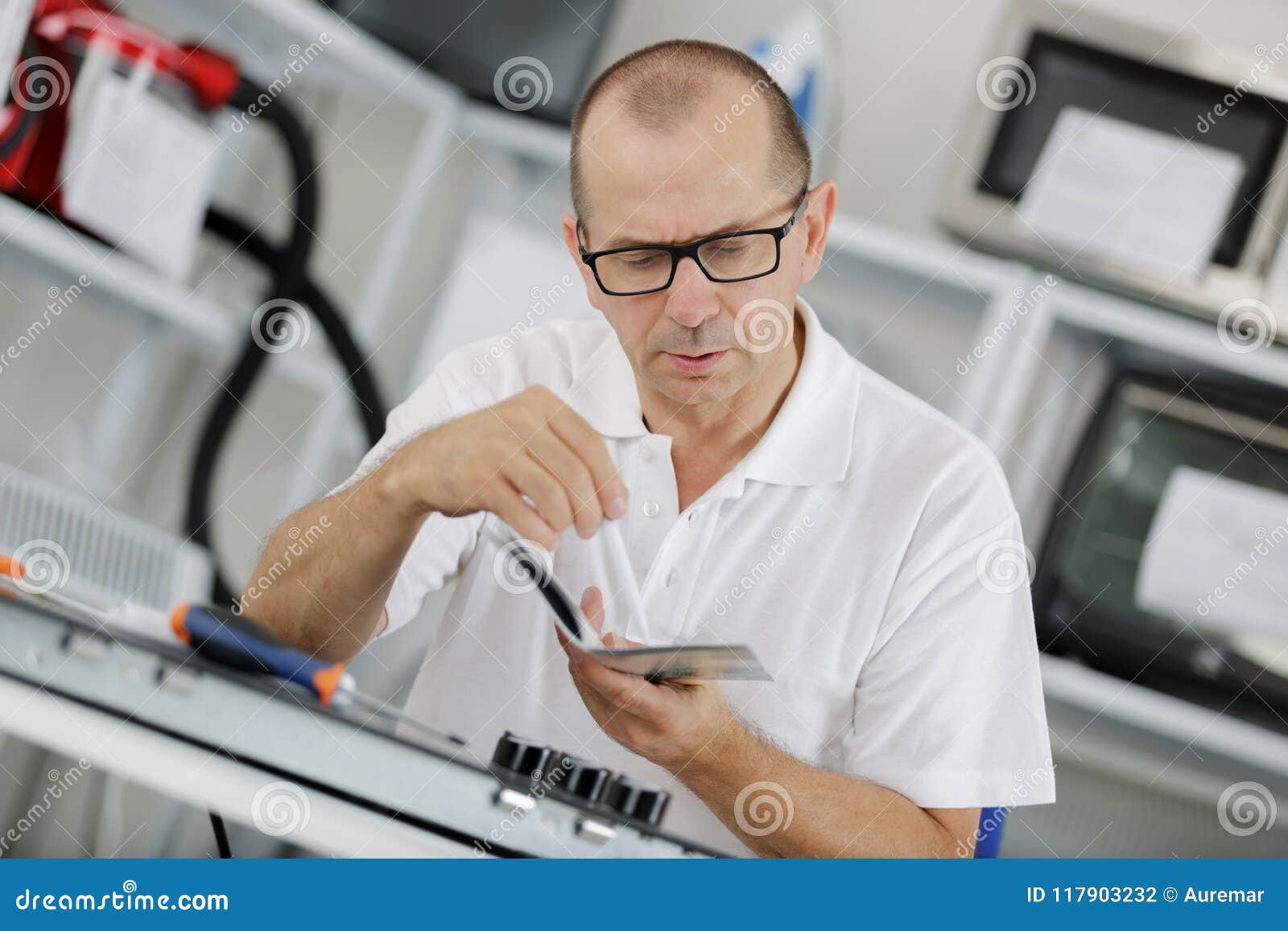 Man Reading Instructions for Electrical Appliance Stock Photo - Image ...