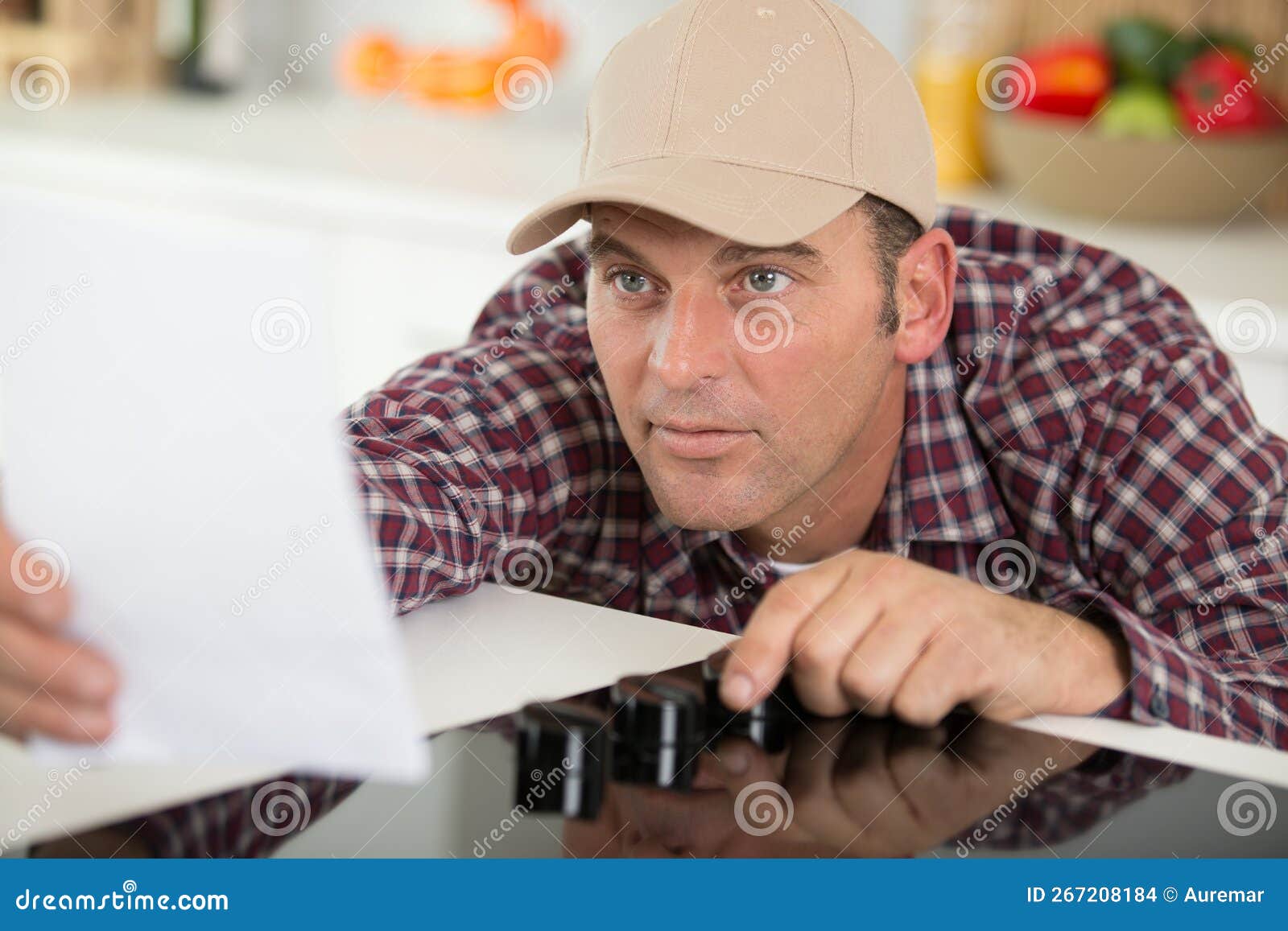Man Reading Instructions before Installing Kitchen Stock Photo - Image ...