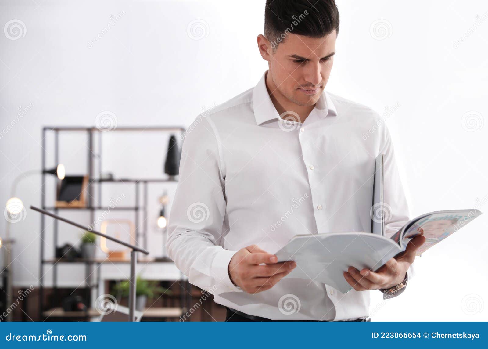 Man Reading Magazine in Office Stock Photo - Image of background, hobby ...