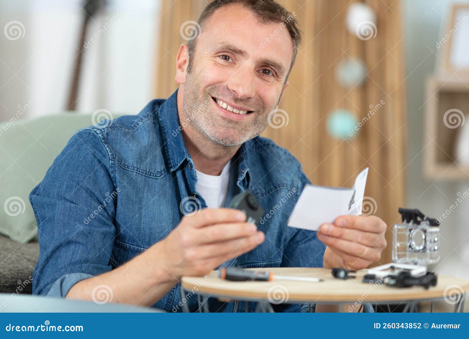 Man Reading Manual New Camera Stock Photo - Image of mobile, friendship ...