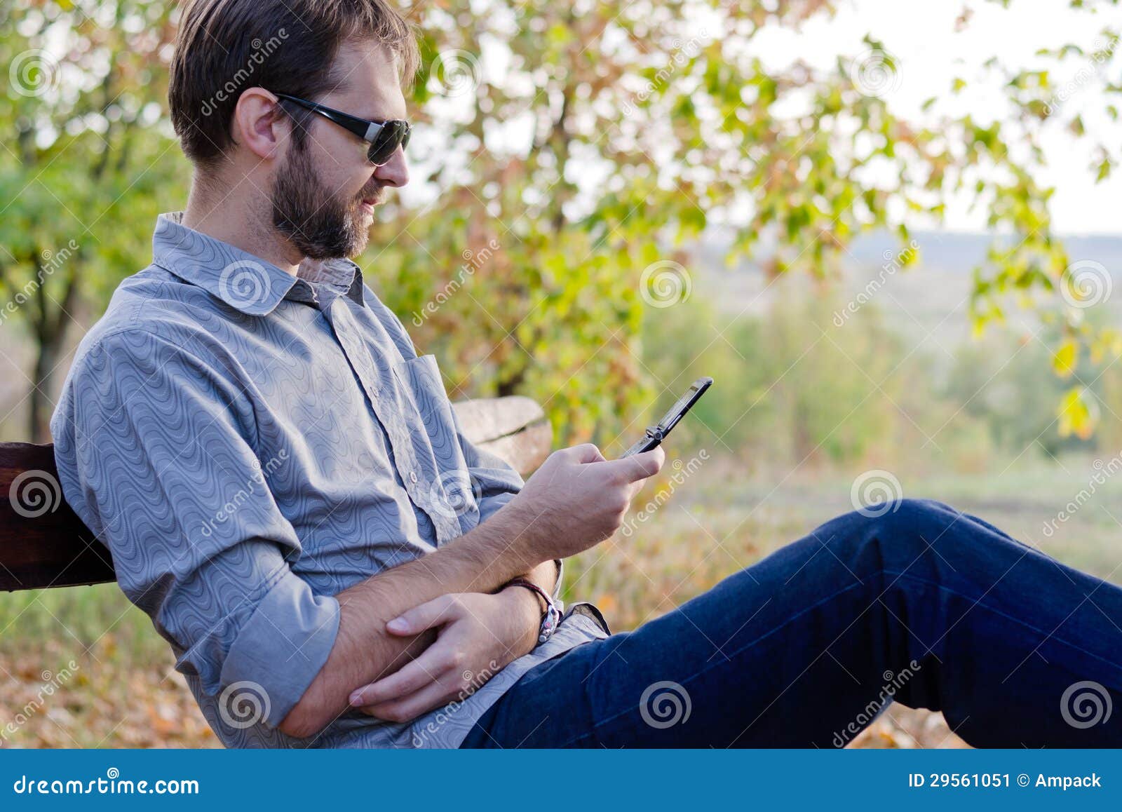 Man reading a message stock image. Image of sunglasses - 29561051