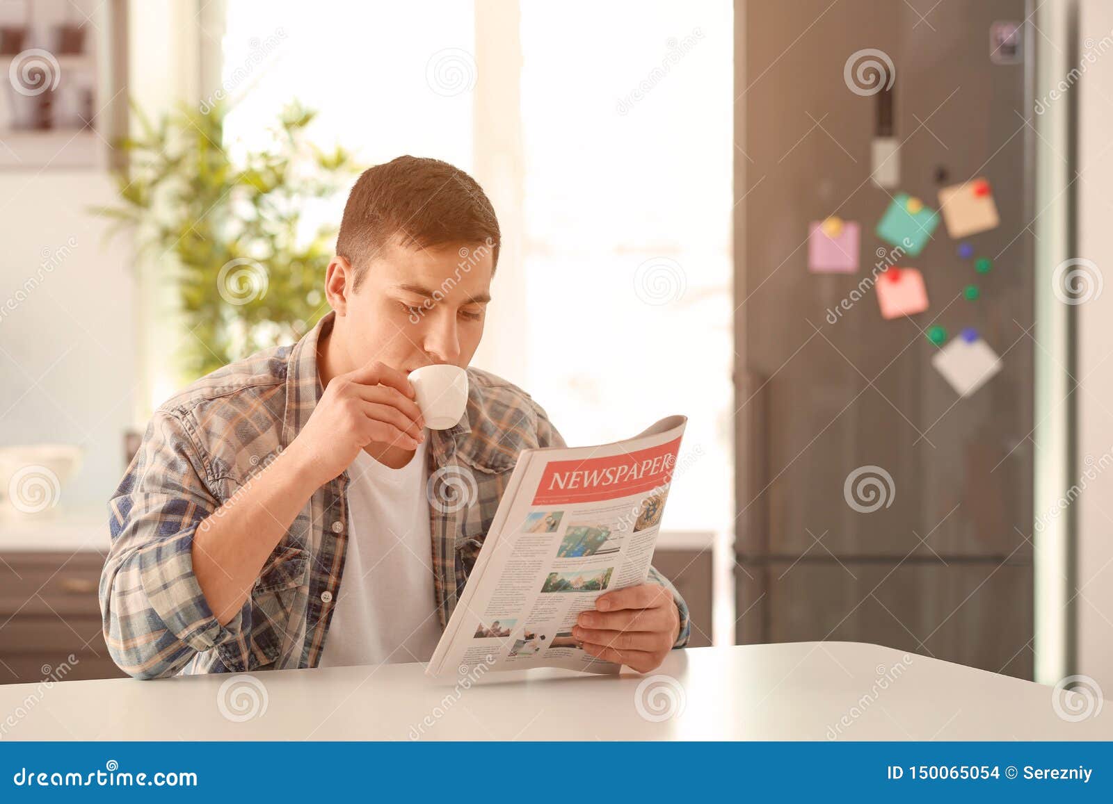 Man Reading Morning Newspaper during Breakfast at Home Stock Photo ...