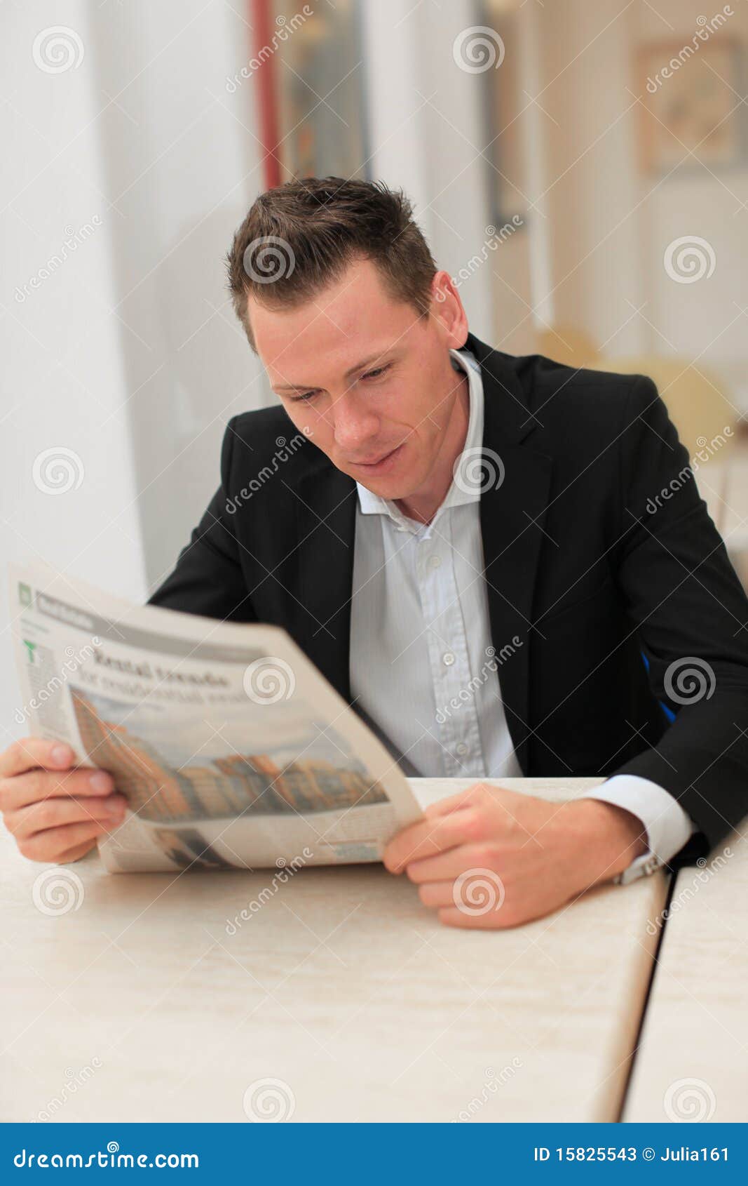 Man reading newspaper stock image. Image of business - 15825543
