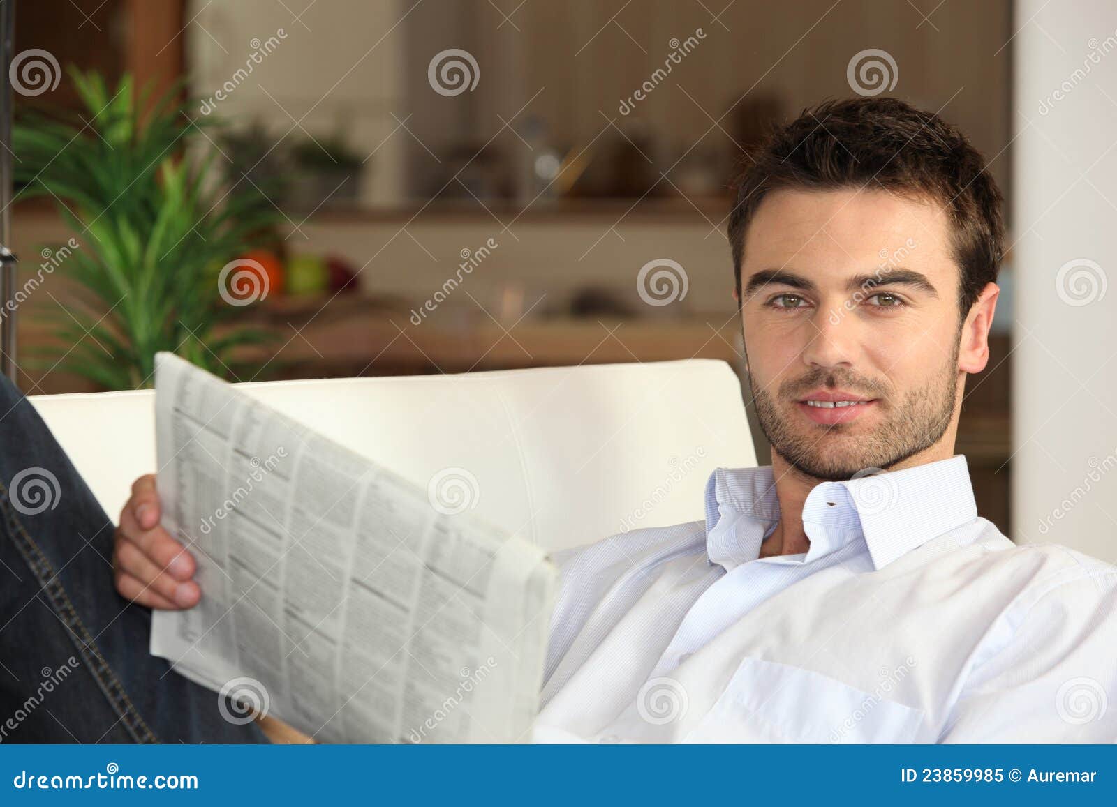 Man reading the newspaper stock image. Image of news - 23859985