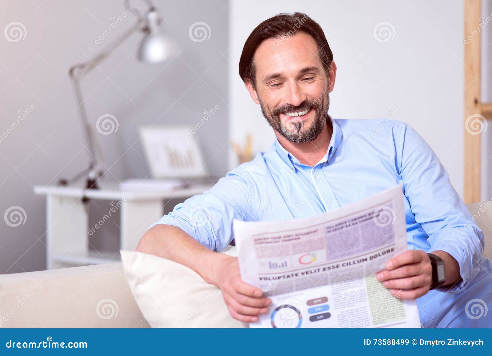 Man Reading Newspaper on Couch Stock Image - Image of attention, glance ...