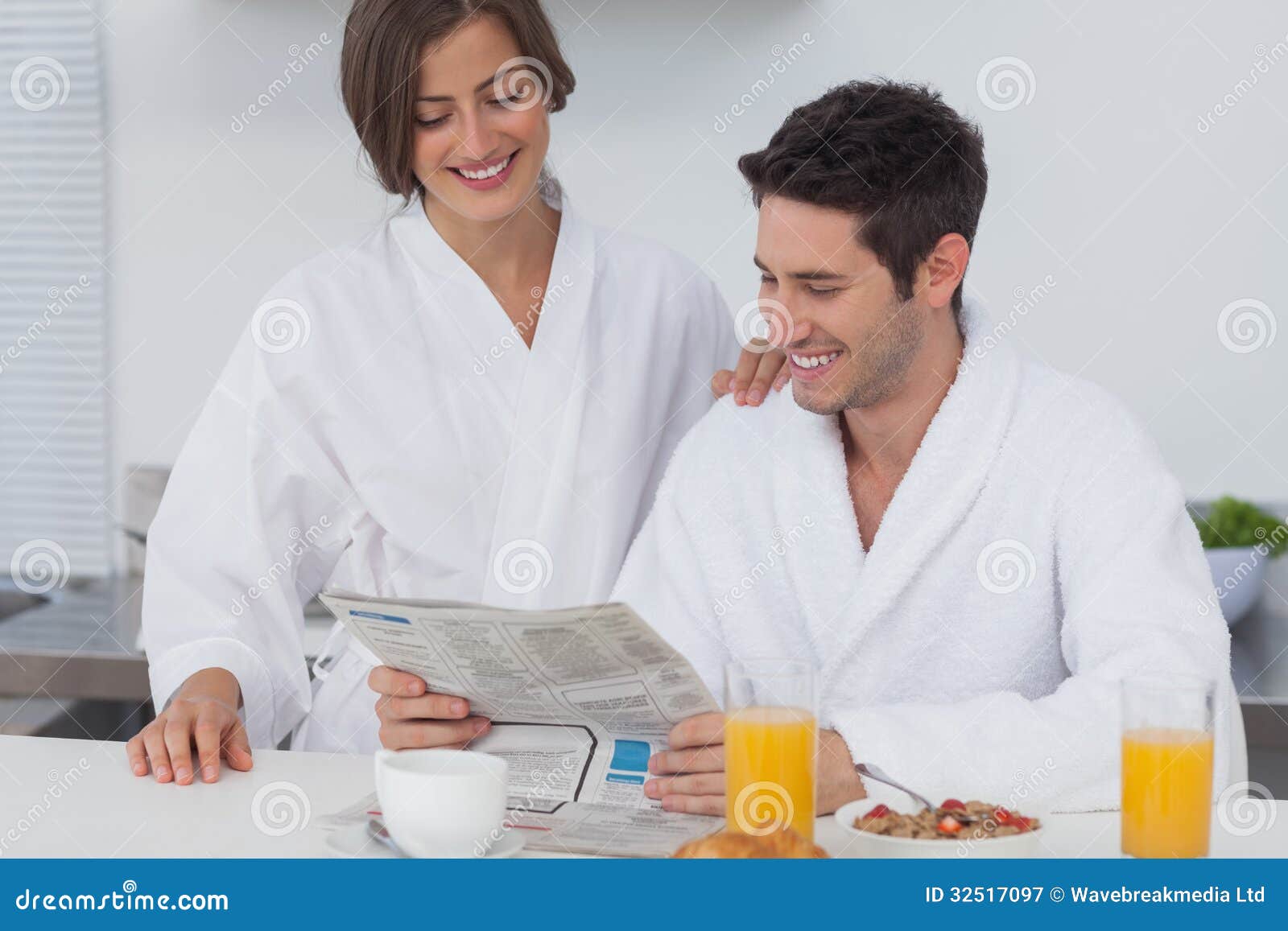 Man Reading a Newspaper while Having Breakfast Stock Image - Image of ...
