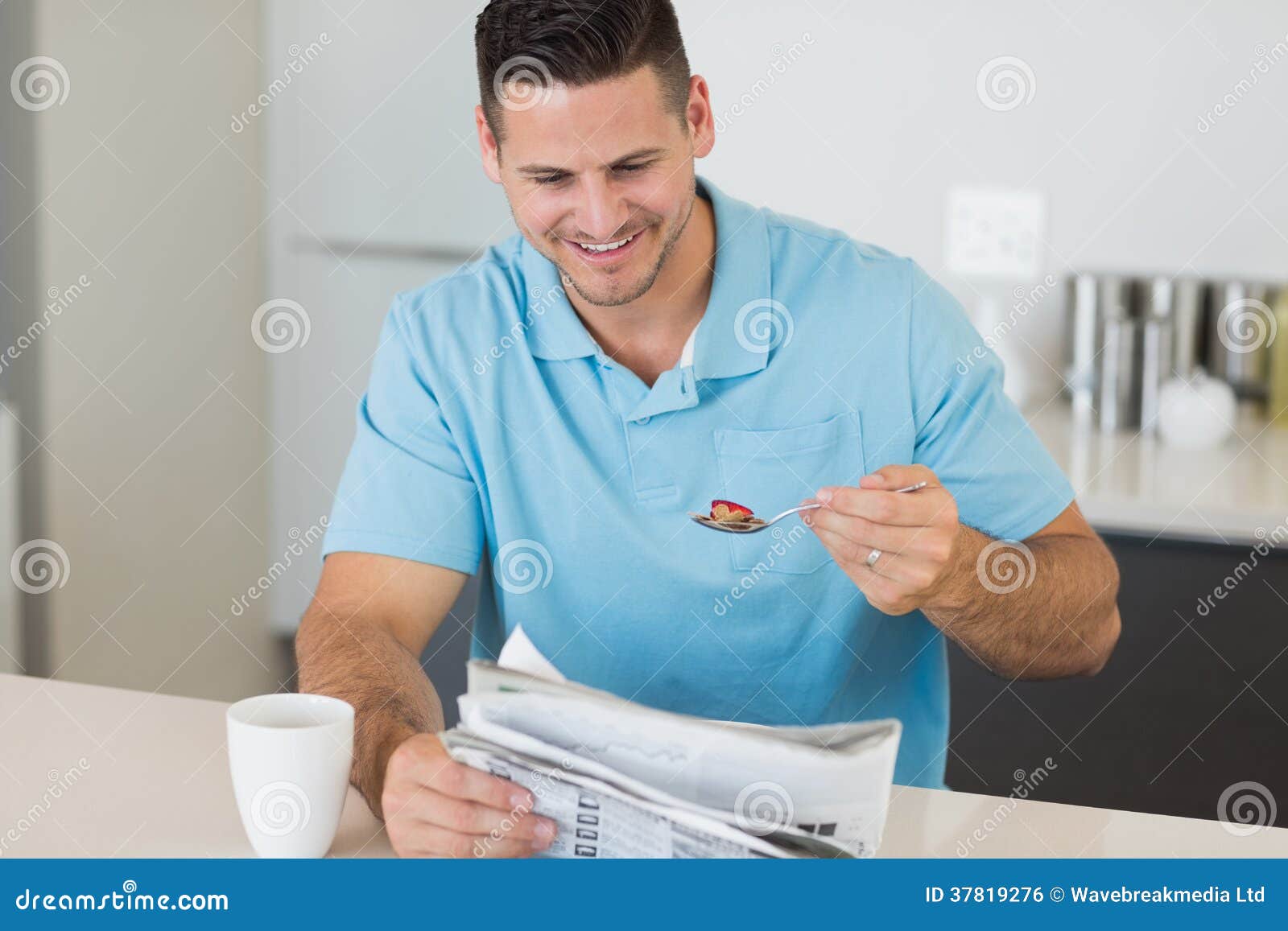 Man Reading Newspaper while Having Breakfast at Table Stock Photo ...