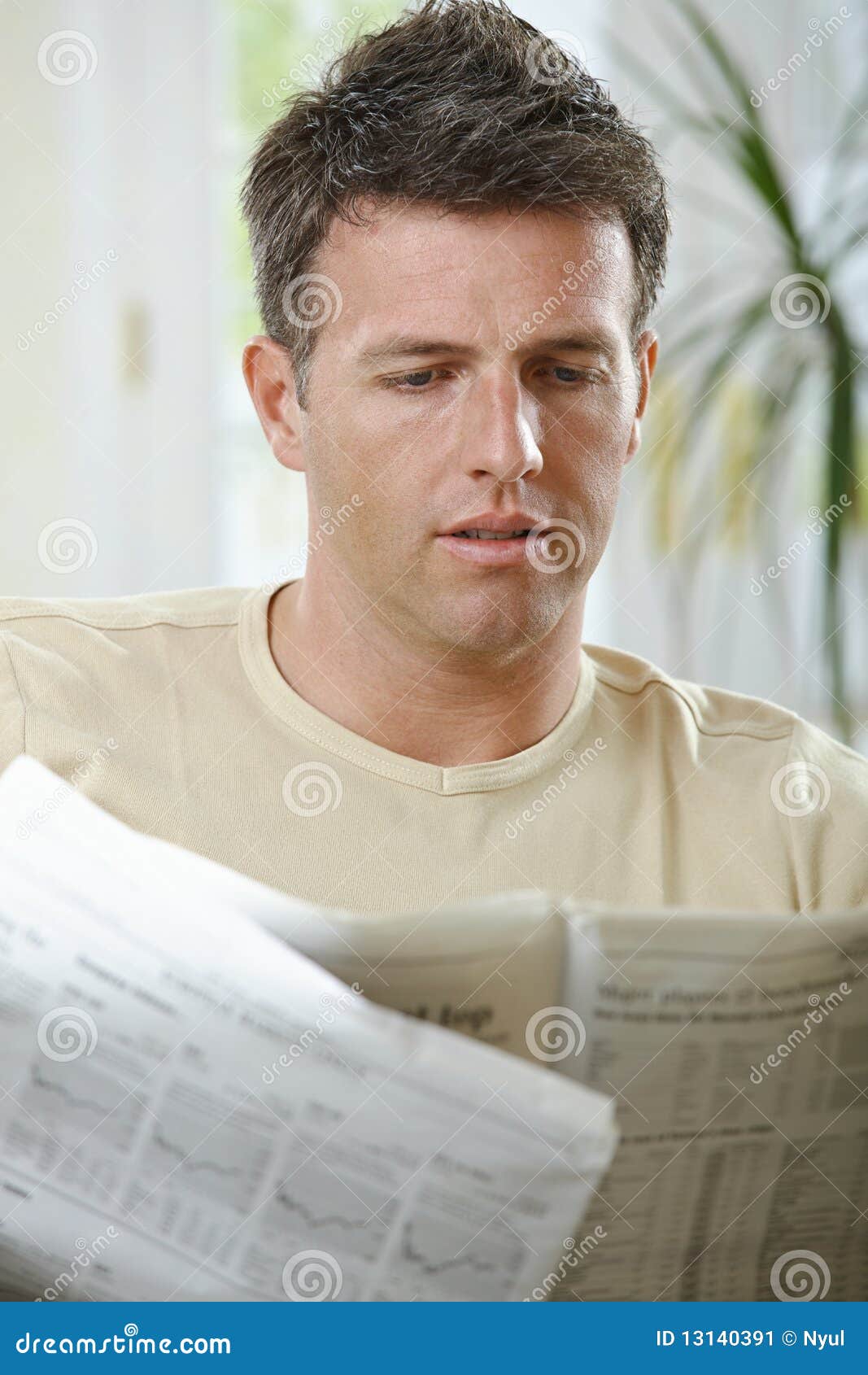 Man Reading Newspaper at Home Stock Image - Image of attention ...