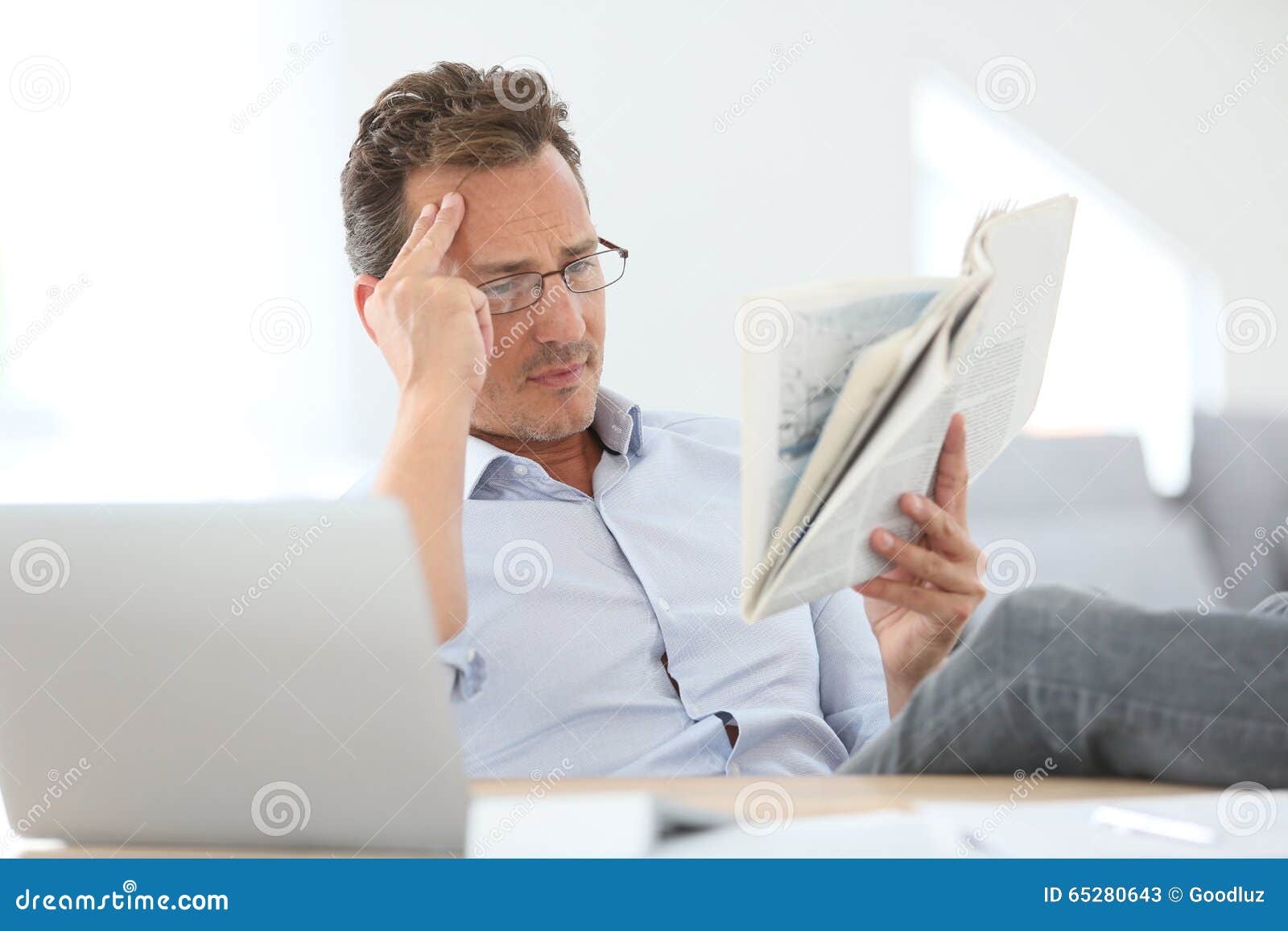 Man Reading Newspaper at Home Stock Image - Image of good, home: 65280643