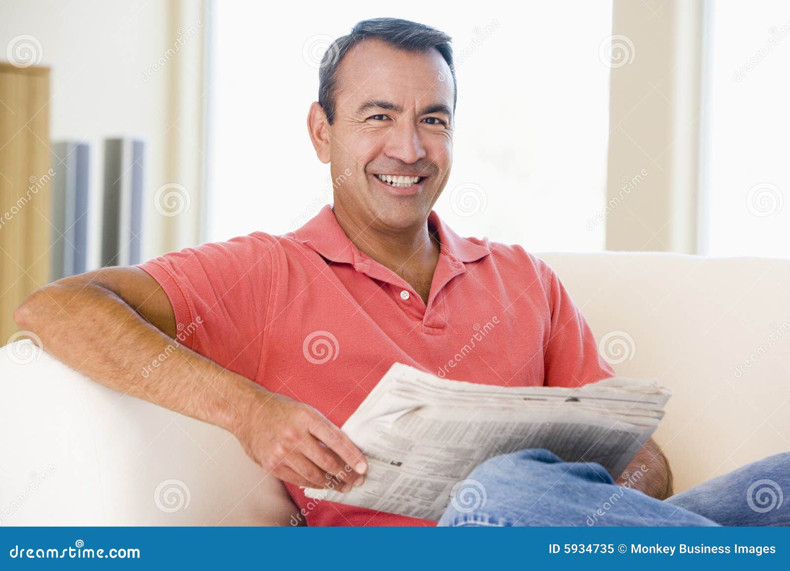 Man Reading Newspaper in Living Room Smiling Stock Image - Image of ...