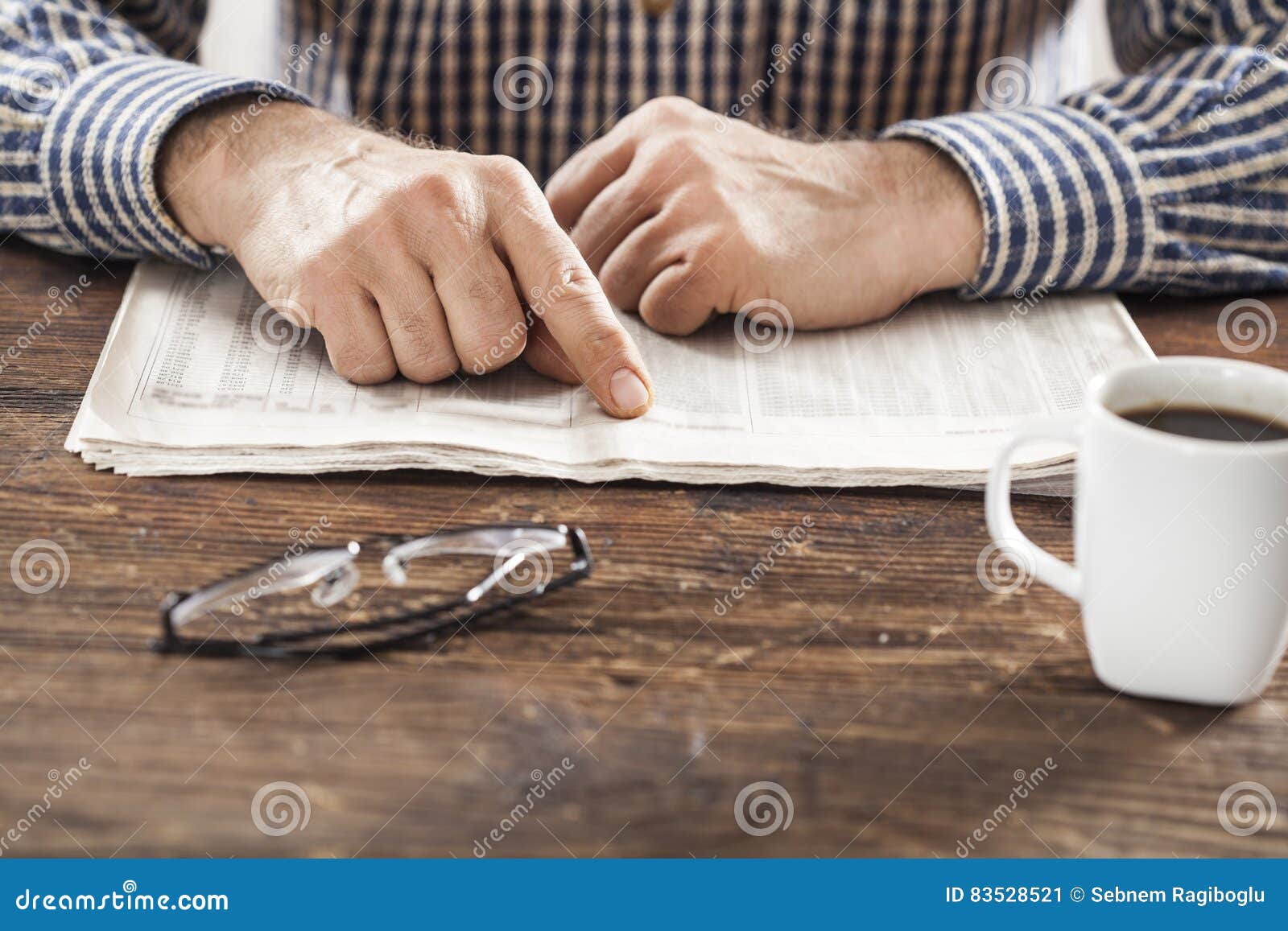 Man Reading Newspaper on Table Stock Image - Image of hand, elderly ...