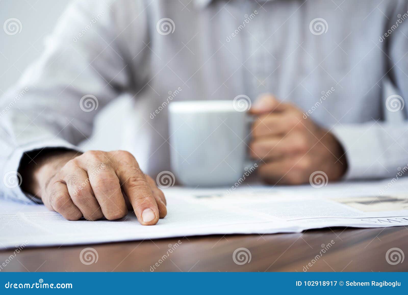 Man Reading Newspaper on Table Stock Image - Image of coffee, printed ...