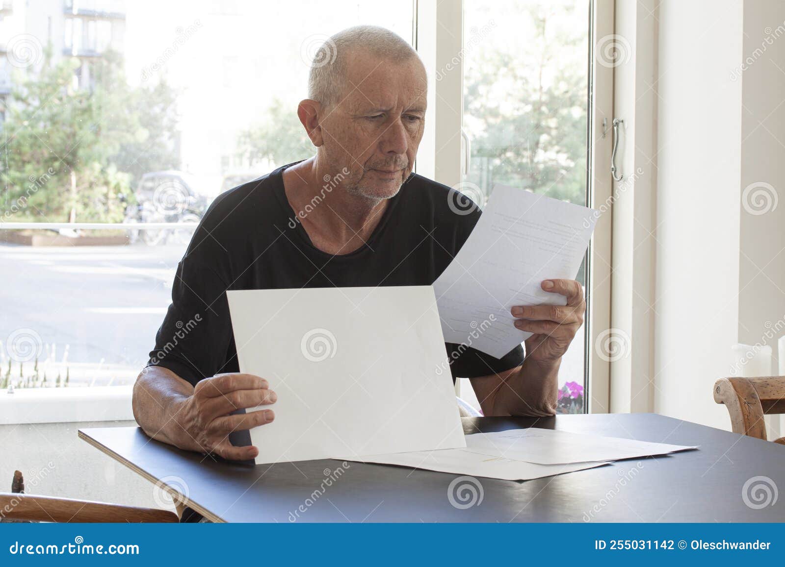 Man Reading Paper Documents Stock Photo - Image of eviction, rejection ...