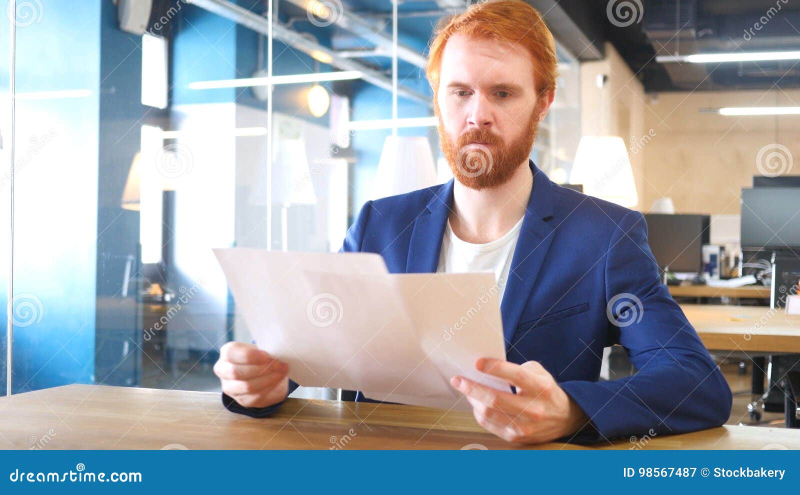 Man Reading Papers in Office Stock Image - Image of attend, info: 98567487 Man Reading Papers in Office Stock Image - Image of attend, info: 98567487