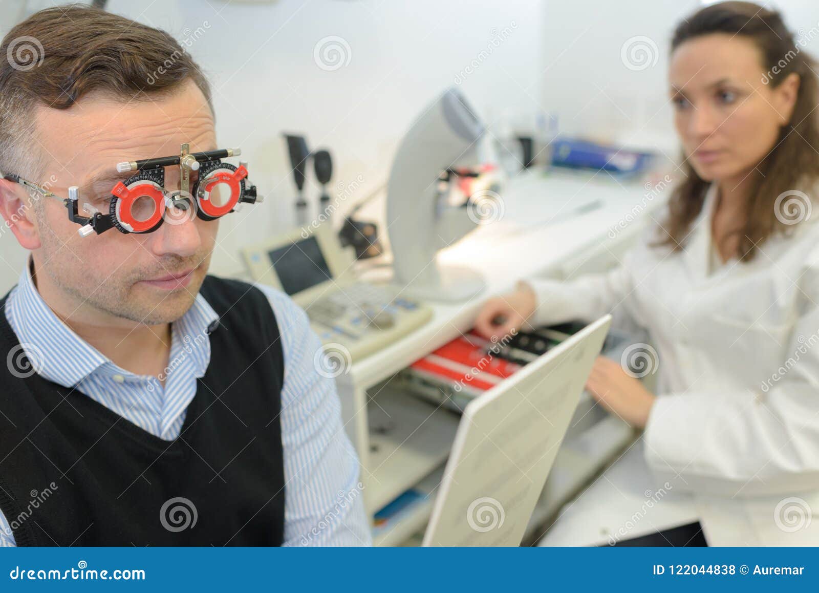 Man Reading Print during Eye Test Stock Photo - Image of check ...