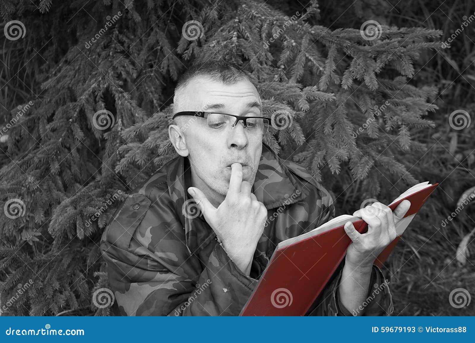 Man Reading Red Book stock image. Image of mouth, learn - 59679193